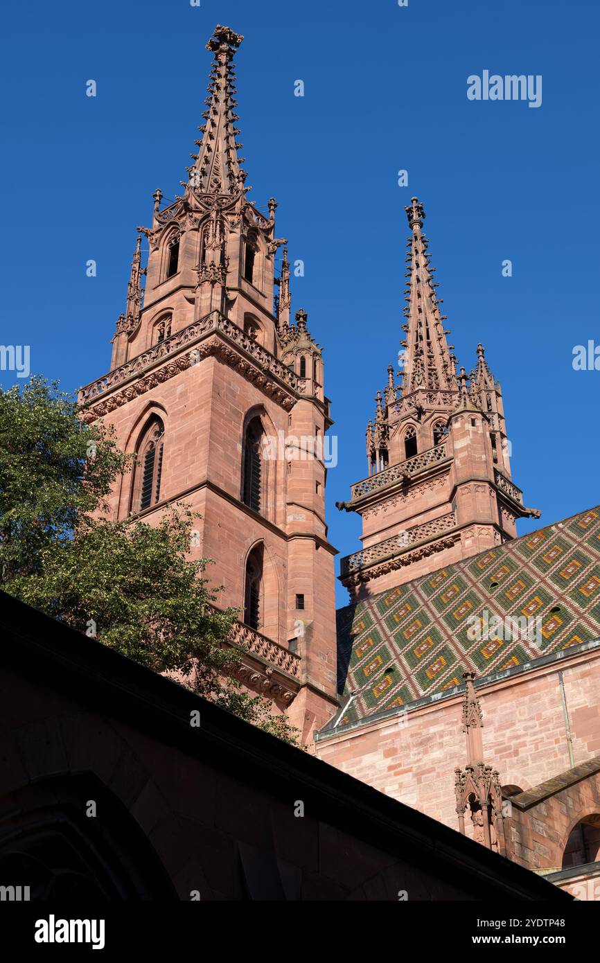 Basel Minster (Basler Munster) Cathedral towers and tiled roof in Basel ...