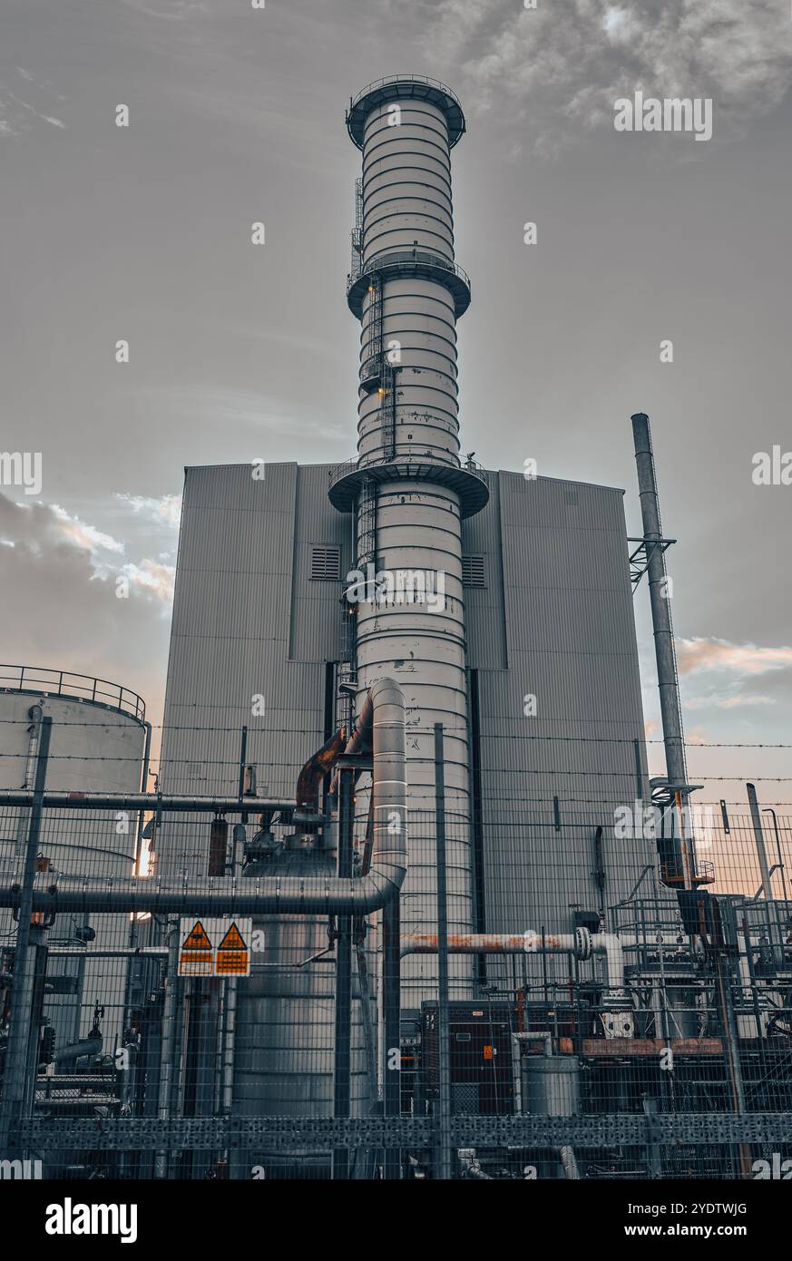 Dramatic picture of industrial plant, with big funnel Stock Photo - Alamy