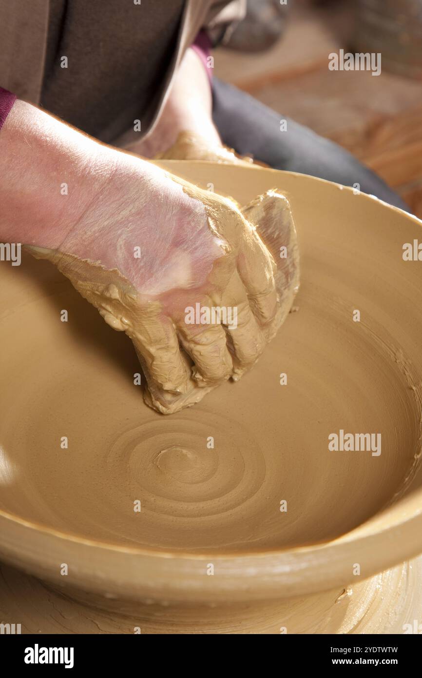 Woman turning wheel hi-res stock photography and images - Alamy