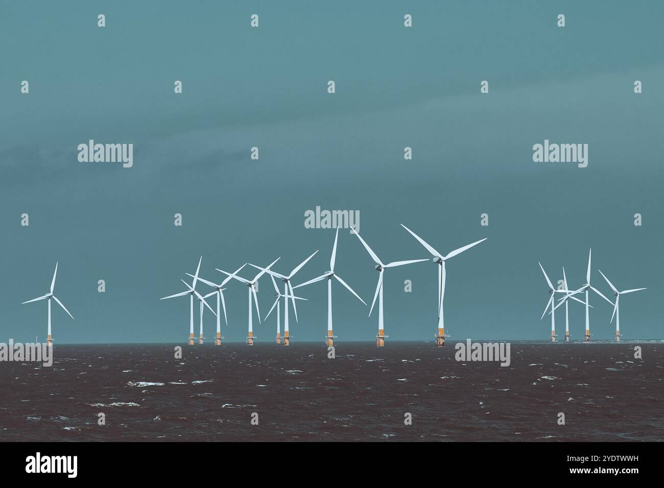 Offshore wind turbines farm in the ocean. Offshore wind turbines ...