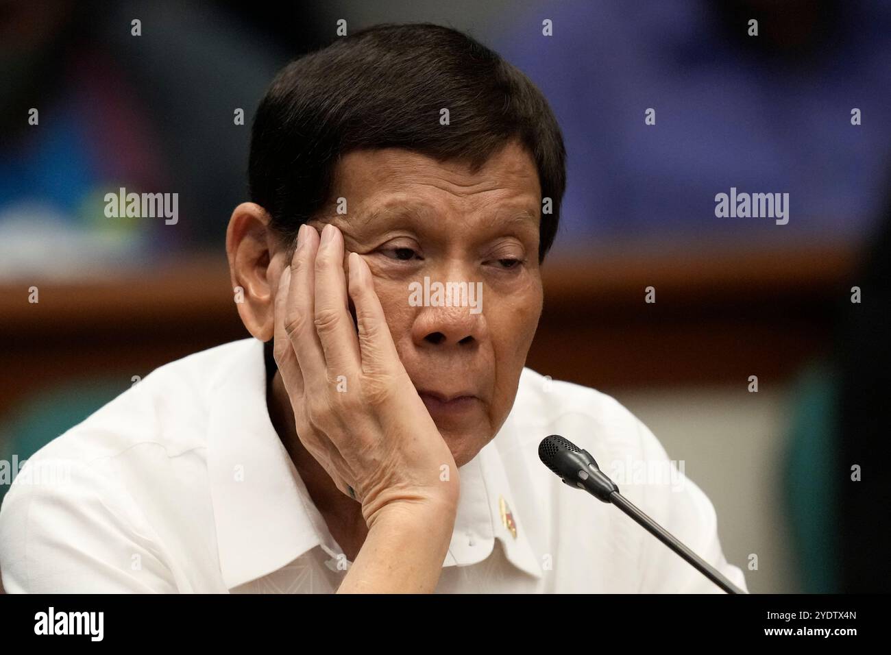 Former Philippine President Rodrigo Duterte attends a senate inquiry on ...