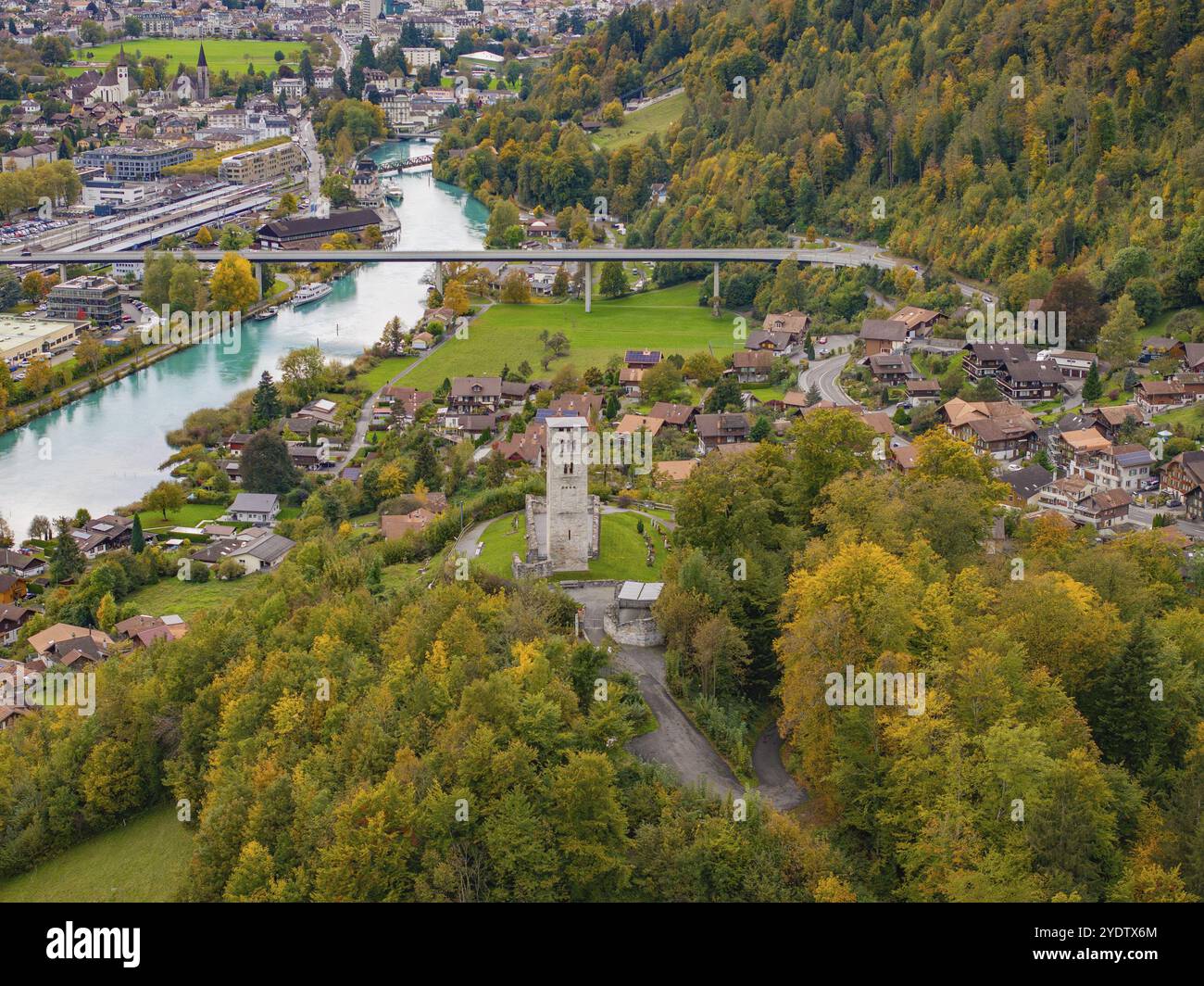 Aerial view of a town in a picturesque mountain landscape with river ...