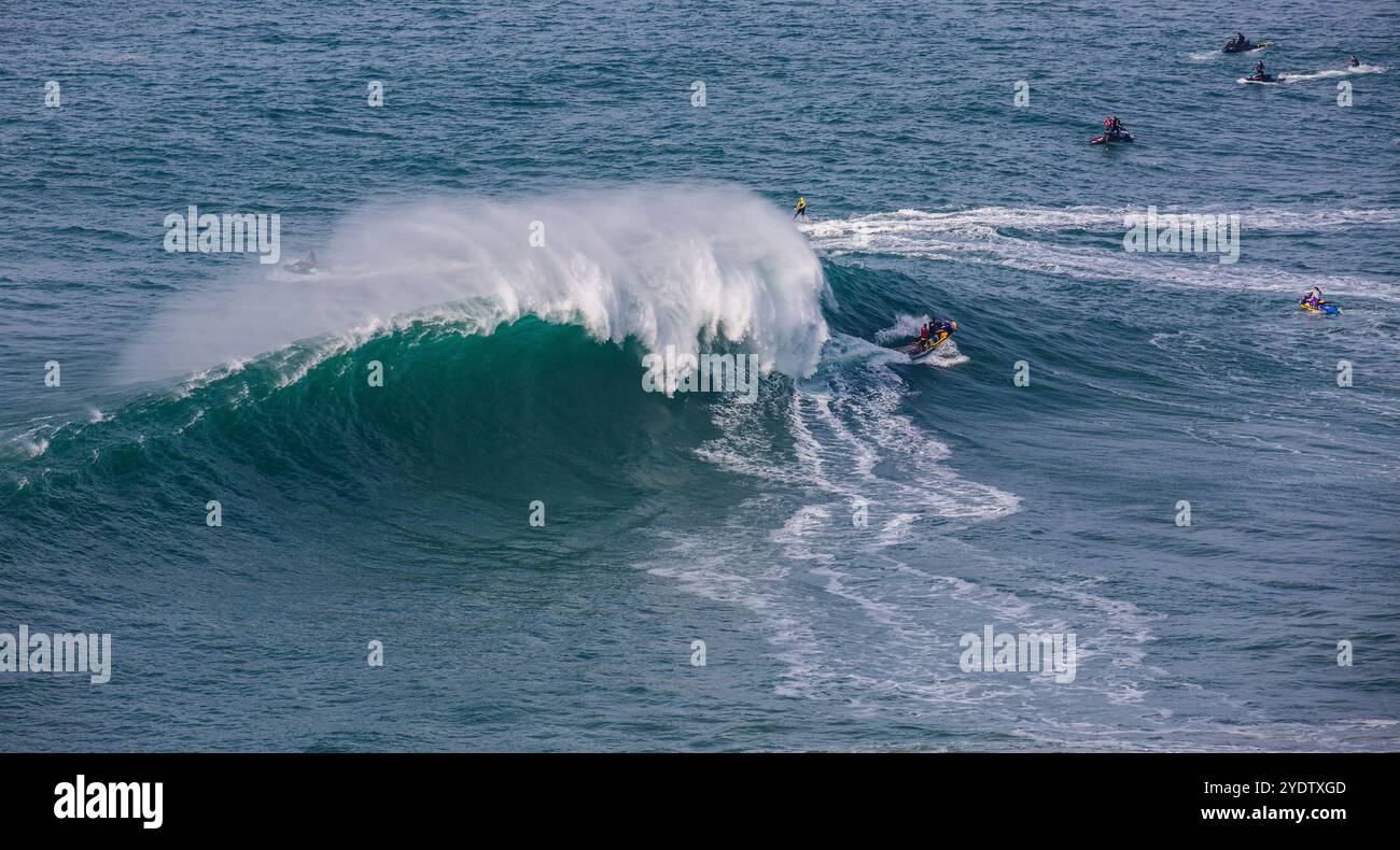Big waves at Nazarè beach in Portugal, photographs of surfers having ...