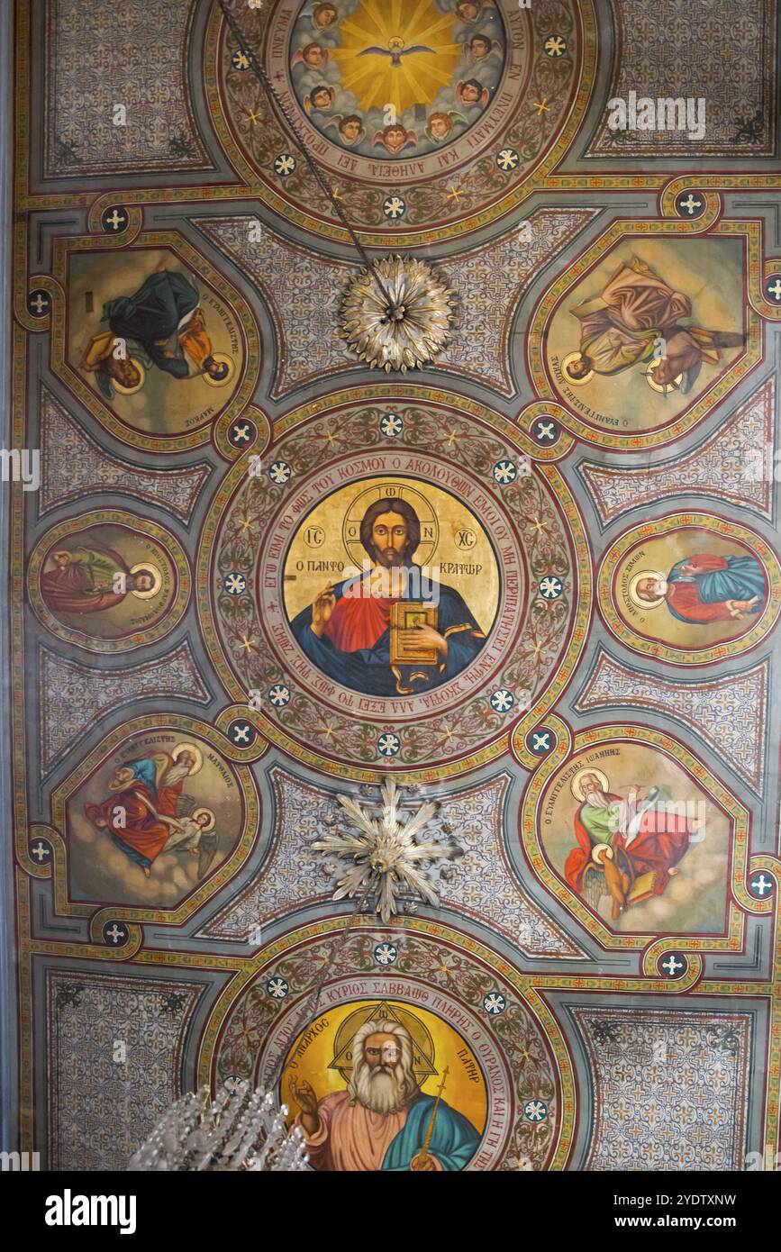 Detailed orthodox fresco on a church ceiling with religious icons and ...