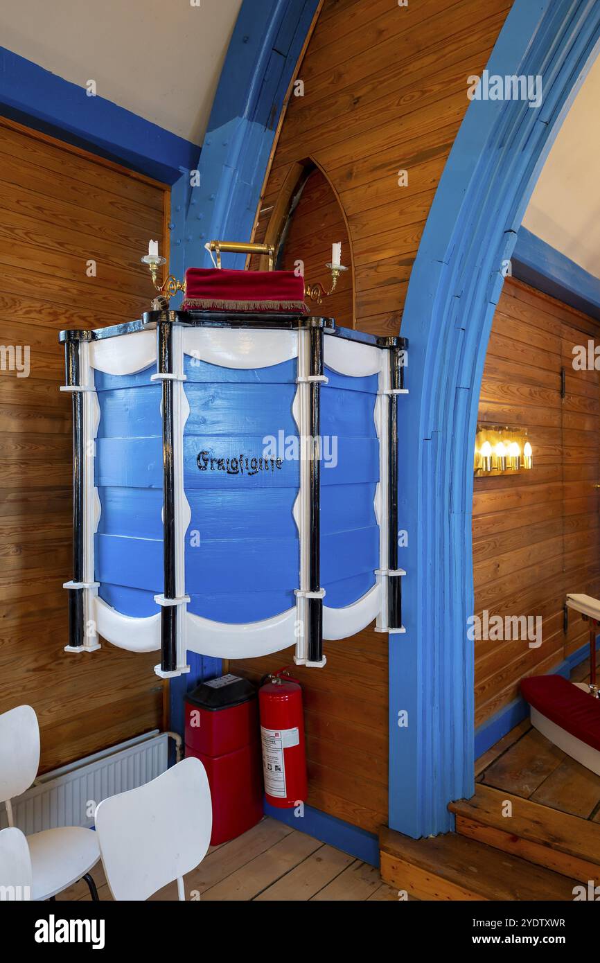 Blue and white pulpit, church interior with wood panelling, church ...