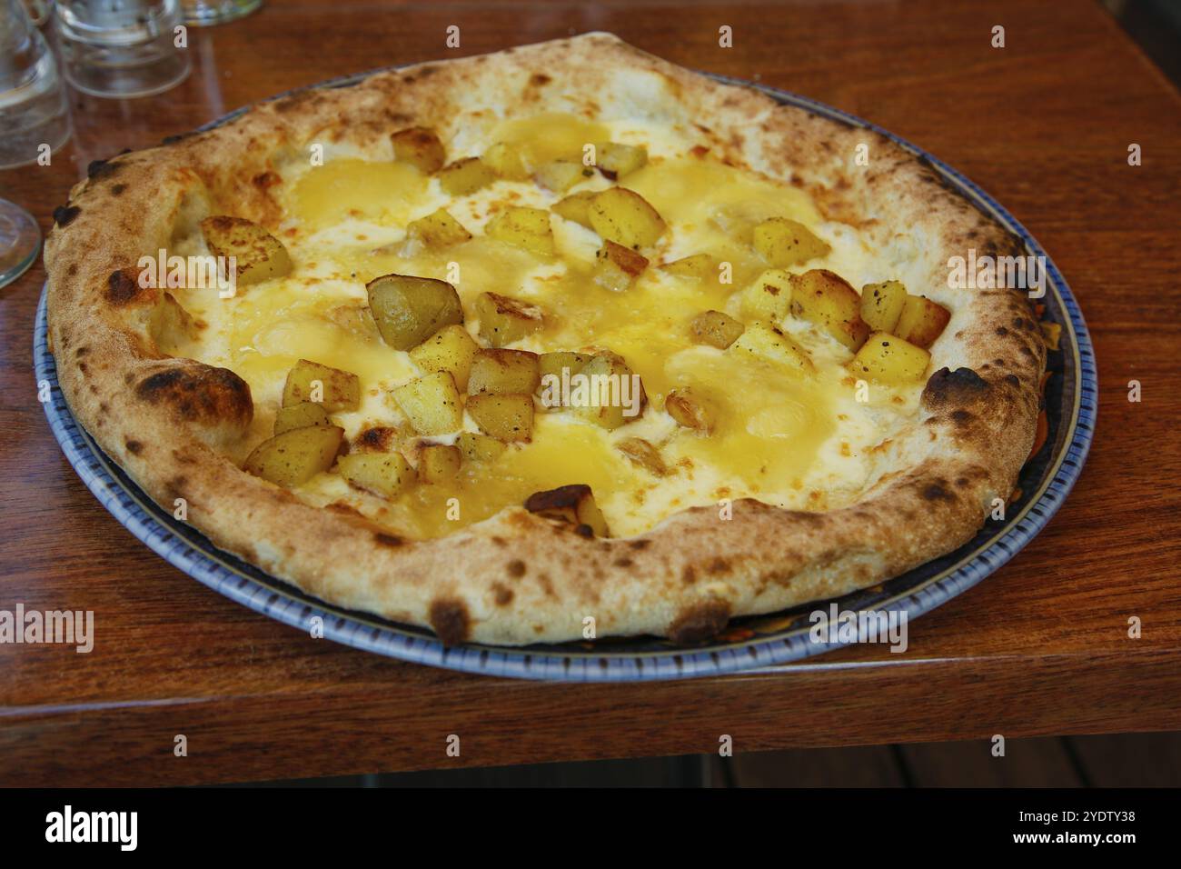 Italian cuisine, Mediterranean cuisine, pizza with potatoes and cheese ...