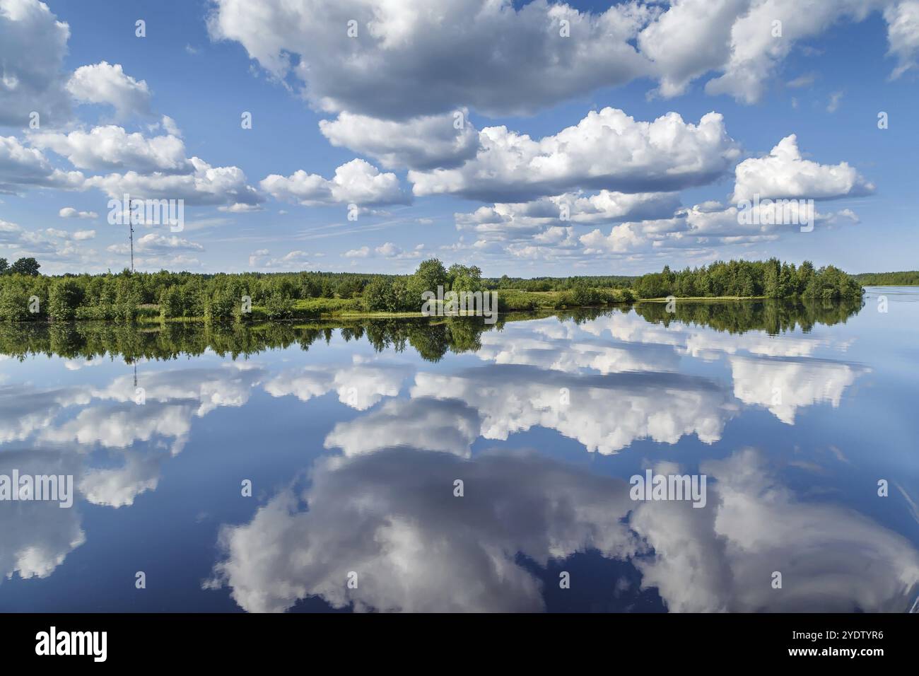 Landscape with a symmetrical reflection on the Vyg river (part of the ...