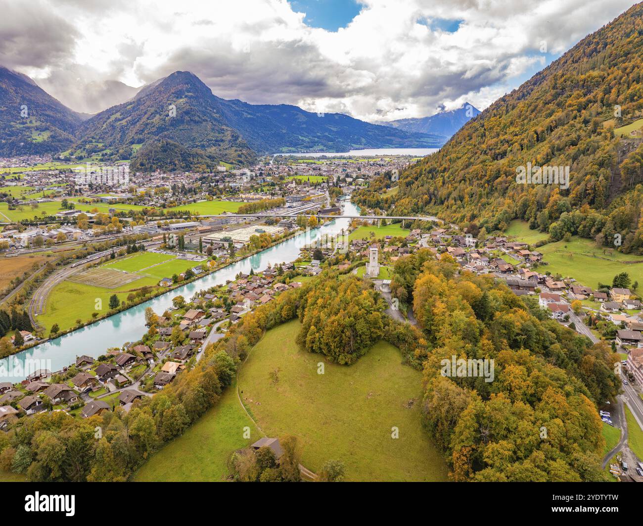 Sweeping views of a landscape with river and mountains under dramatic ...