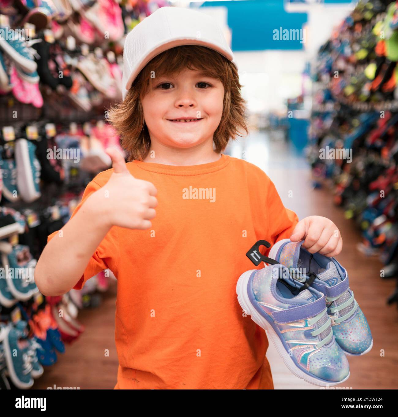 Child buying shoes hi-res stock photography and images - Alamy