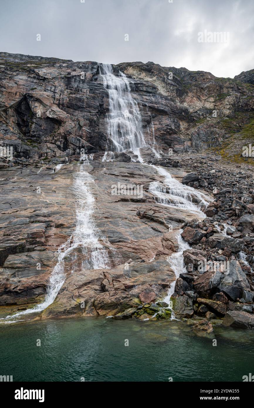 Waterfall near the Eqi glacier, Ilulissat, Western Greenland, Denmark ...