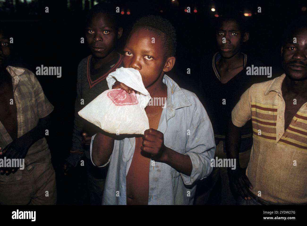 Street Boys Inhaling Glue Stock Photo - Alamy