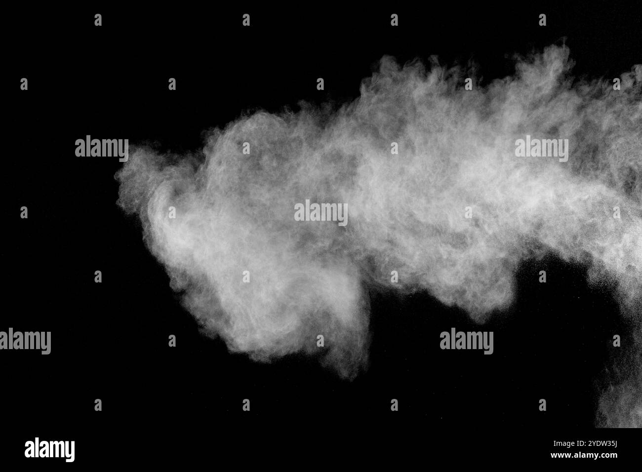 Bizarre forms of white powder explosion cloud against black background ...