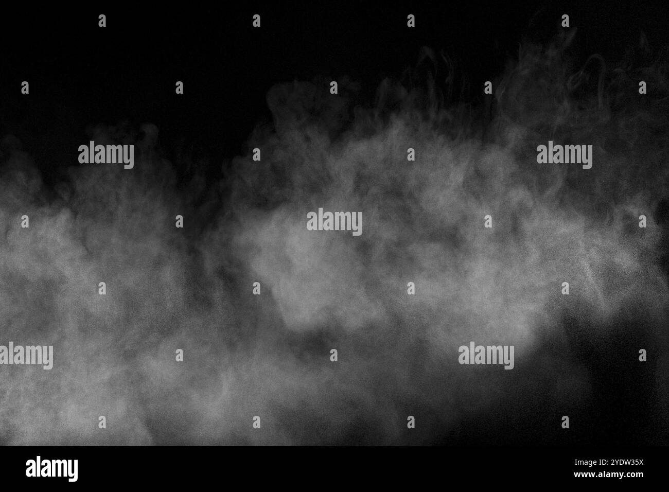 Bizarre forms of white powder explosion cloud against black background ...