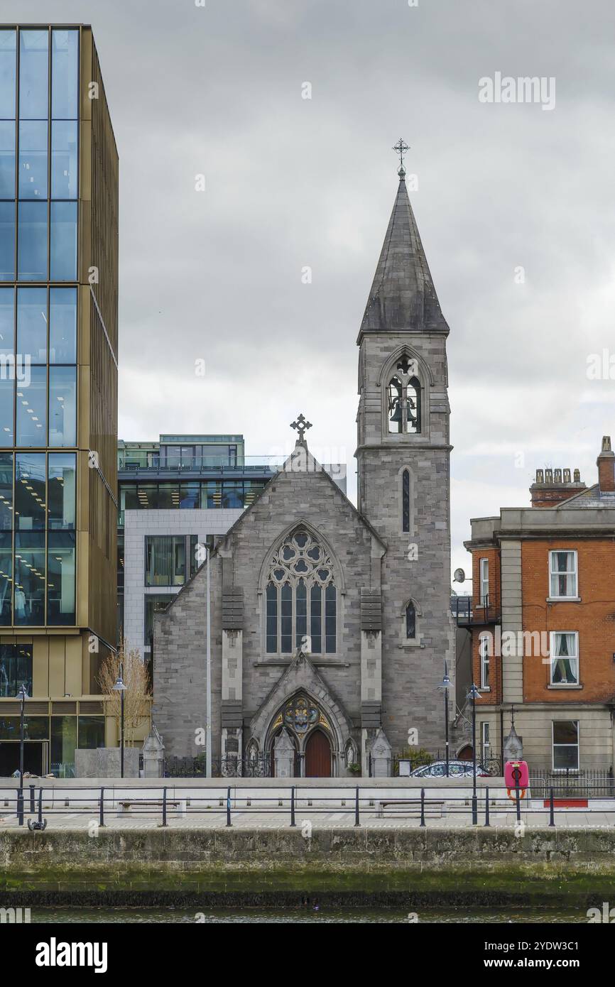 Immaculate heart of Mary church on Liffey river embankment, Dublin ...