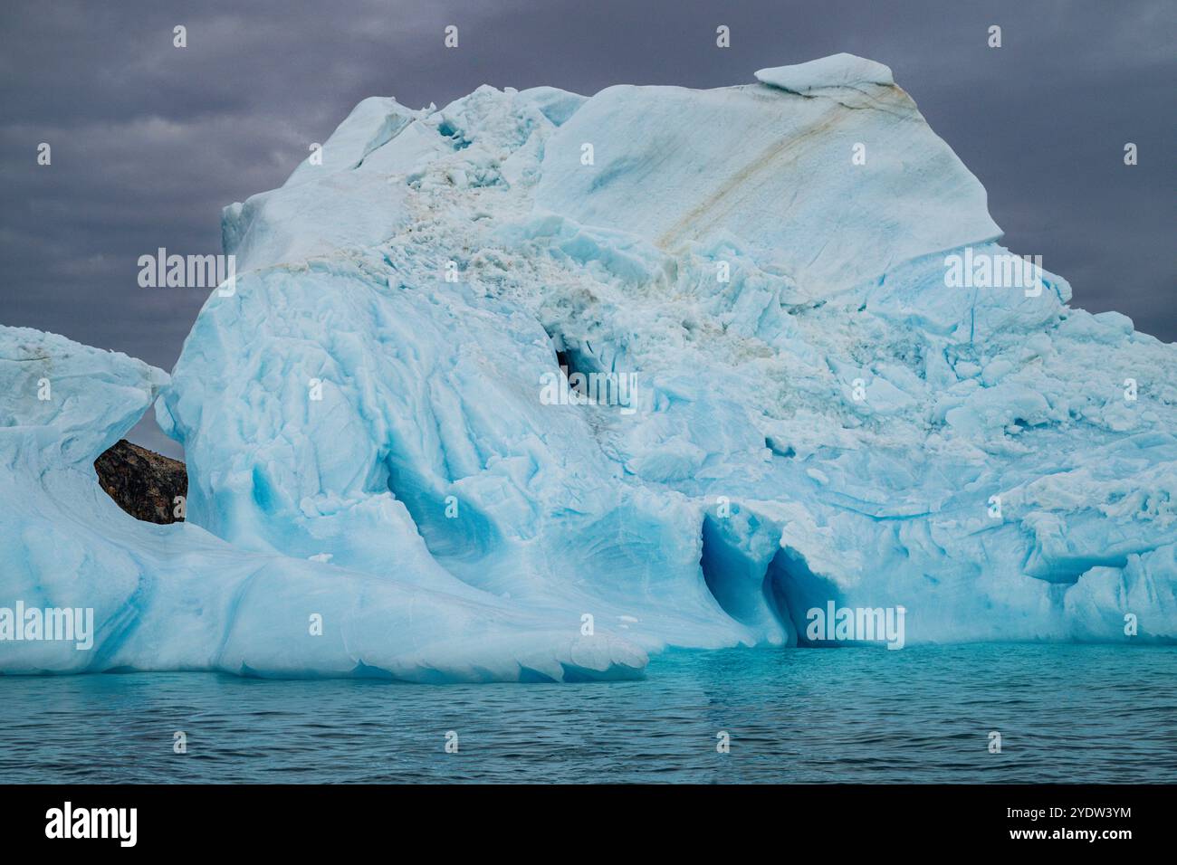 Hole in an iceberg, Belcher island, Devon island, Nunavut, Canadian ...
