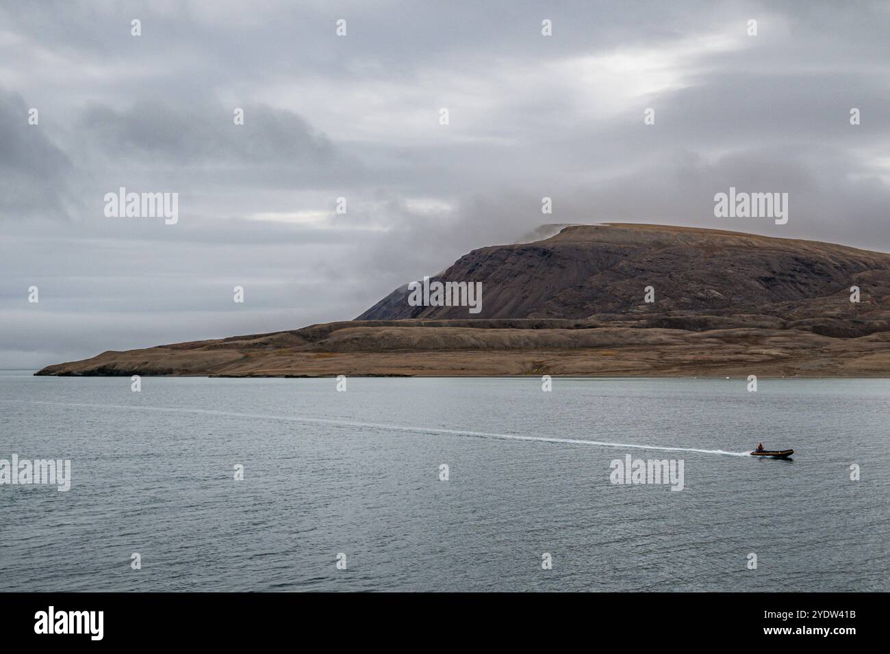 Zodiac in the Arctic desert in Dunes harbour, Devon island, Nunavut ...