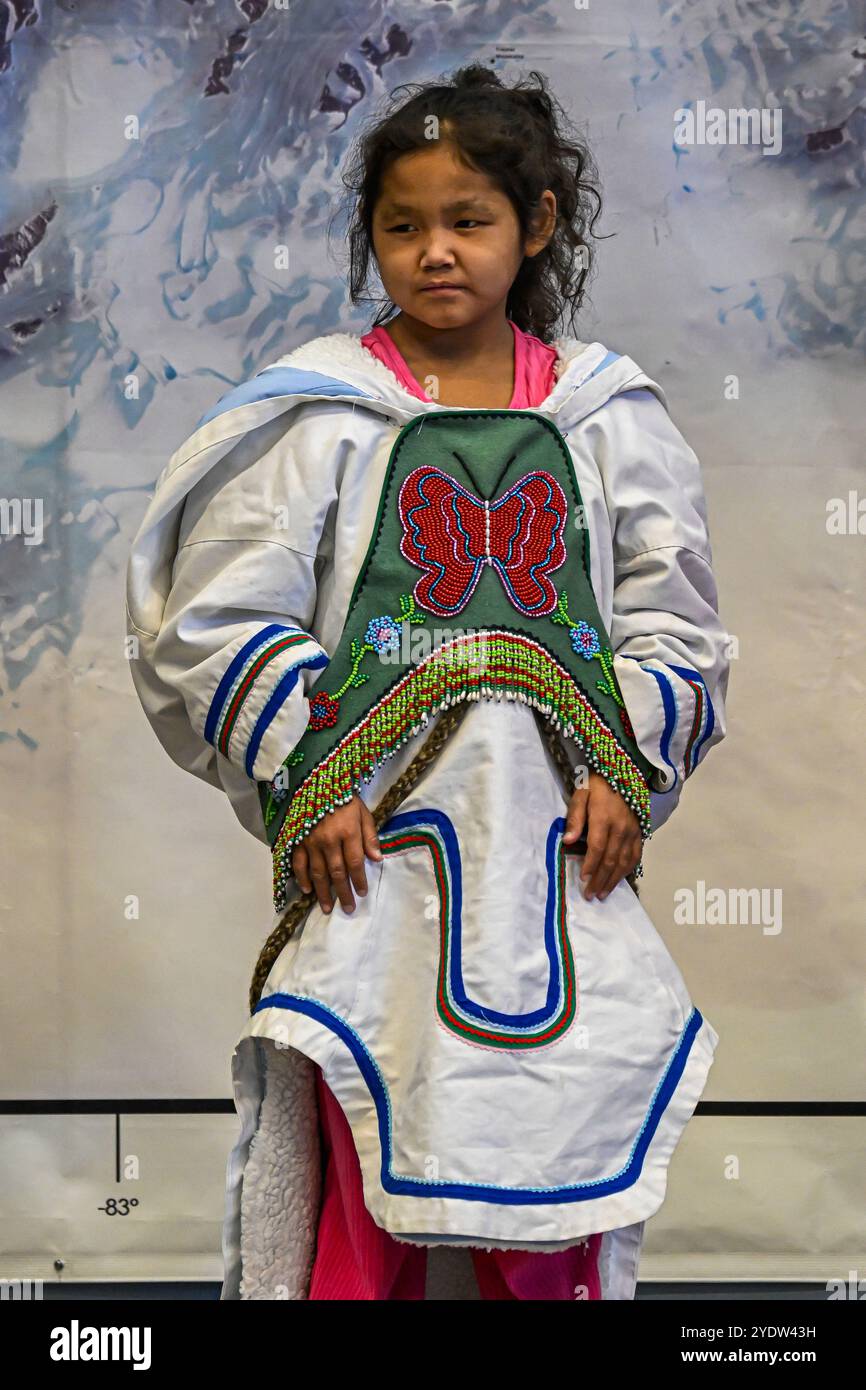 Inuit girl in traditional dress, Grise Fjord, most northern community in America, Nunavut ...