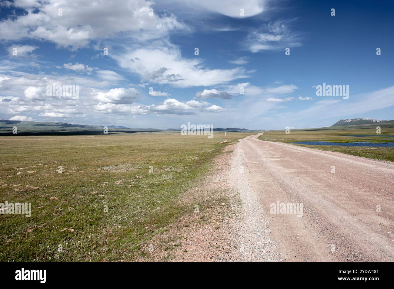 Road through fields wind hi-res stock photography and images - Alamy