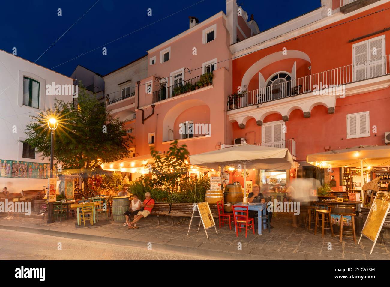 View of restaurant on Via Luigi Mazzella at night, Port of Ischia ...