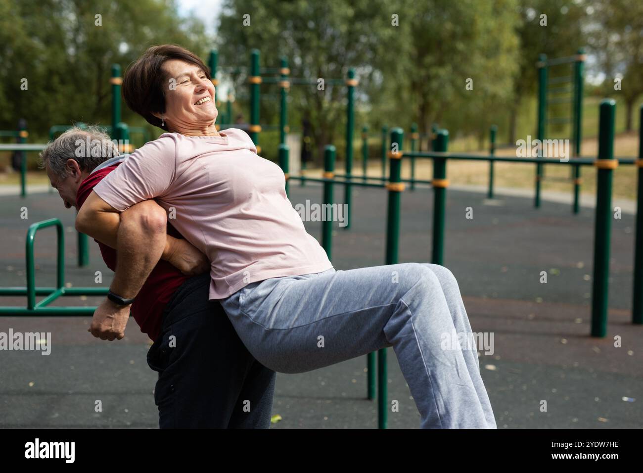Concept of healthy lifestyle for elderly. Married couple raise each ...
