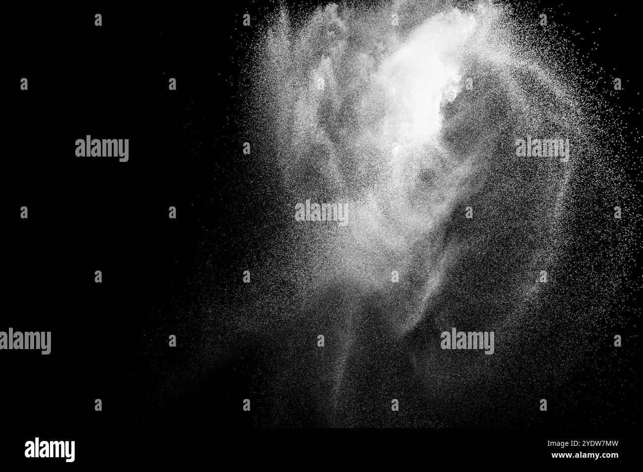Bizarre forms of white powder explosion cloud against black background ...