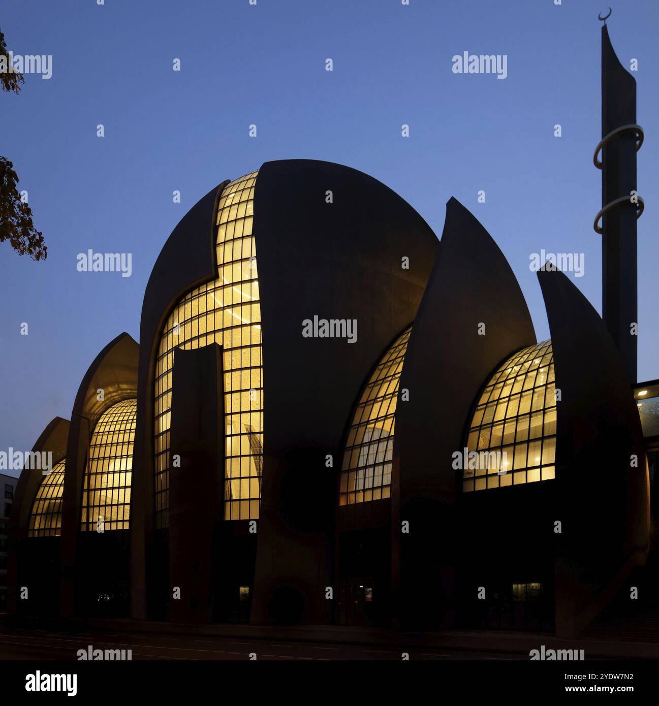 The illuminated Cologne Central Mosque in the blue hour Stock Photo - Alamy