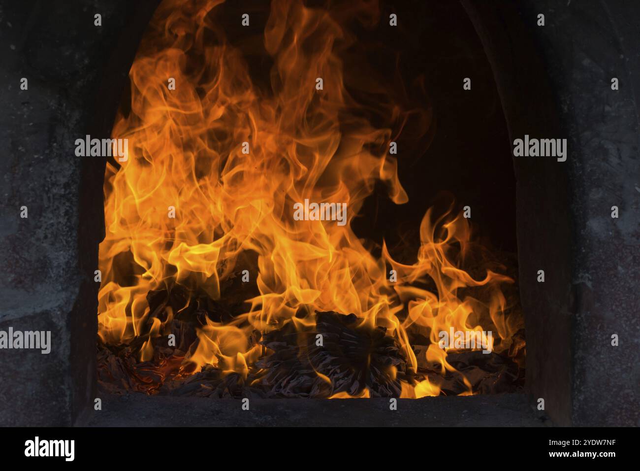 The flames are burning in the furnace. Blazing flames flare in the ...