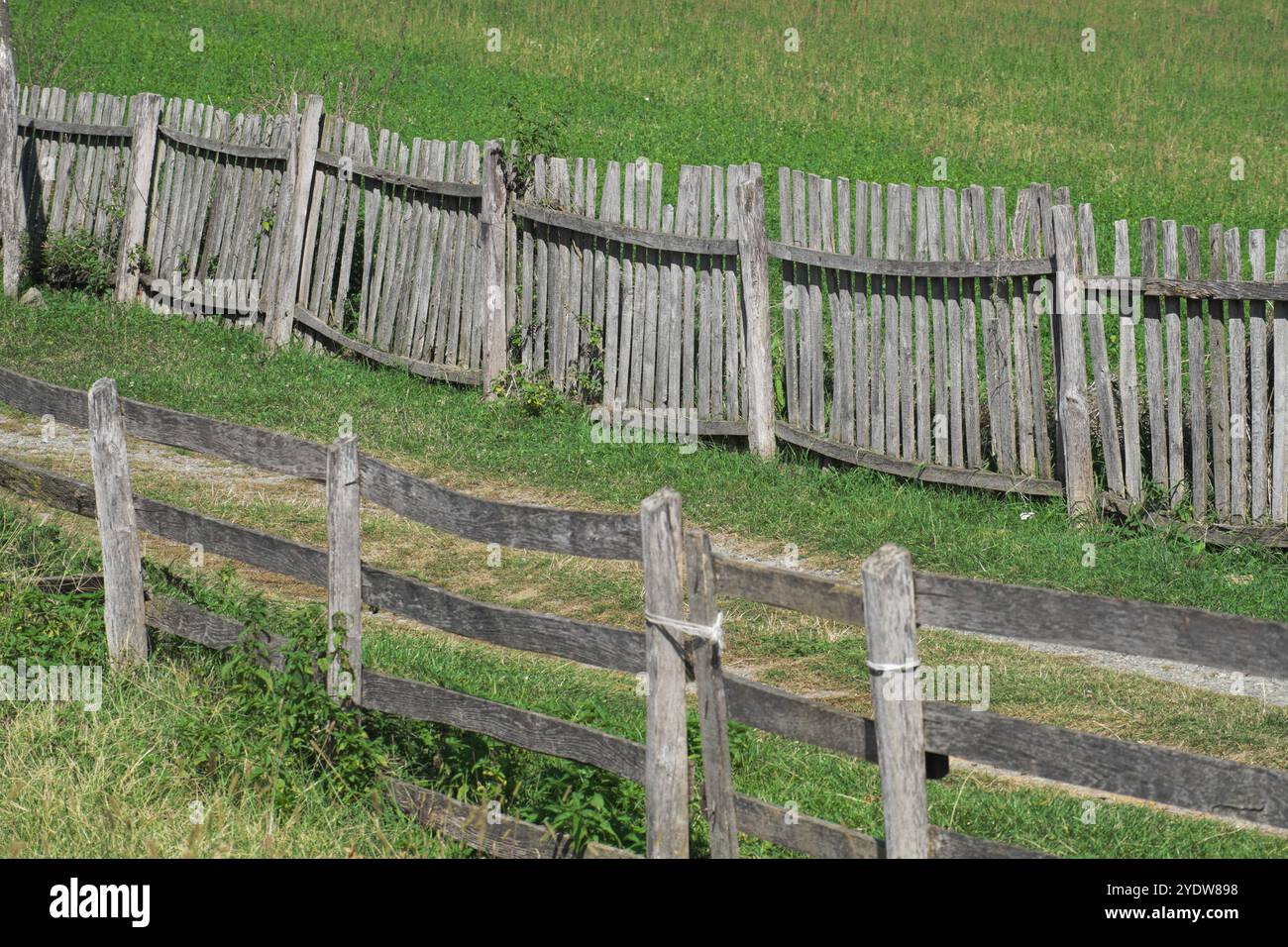 an old wooden fence along a path in the village of Donja Crnuca ...
