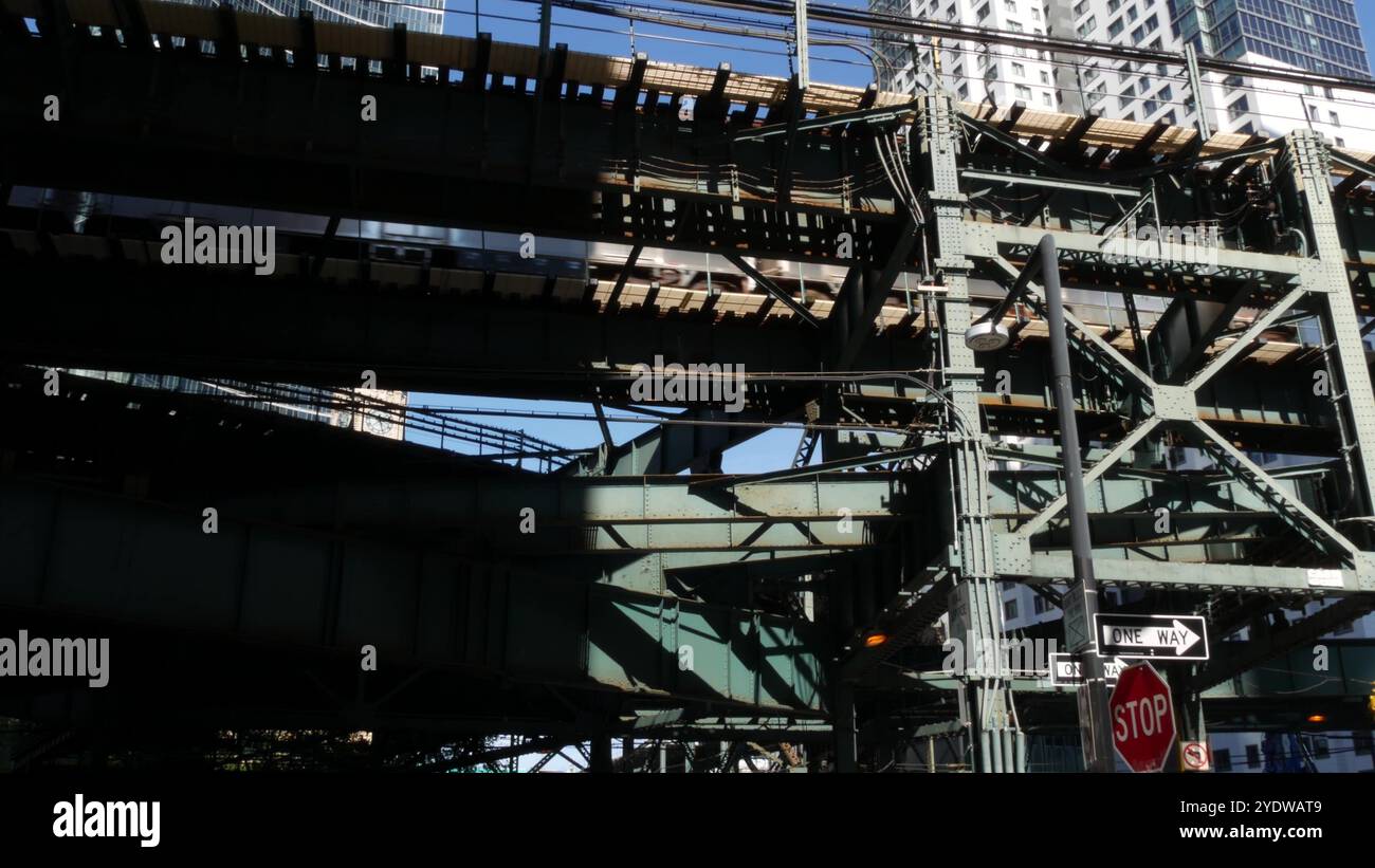 New York elevated subway, metropolitan bridge, metro track above street ...