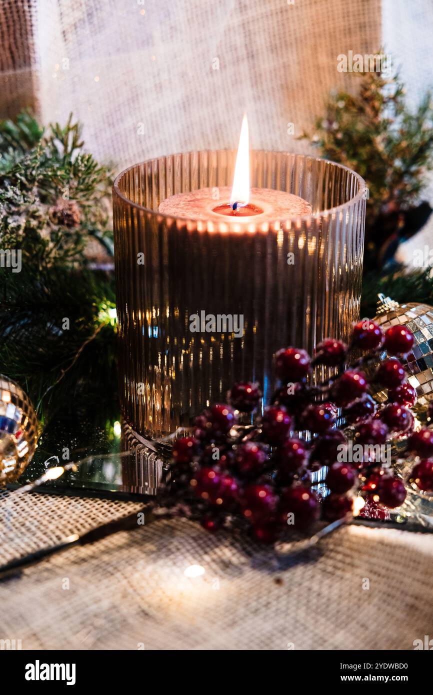 Holiday Scene with Glowing Candle Stock Photo - Alamy