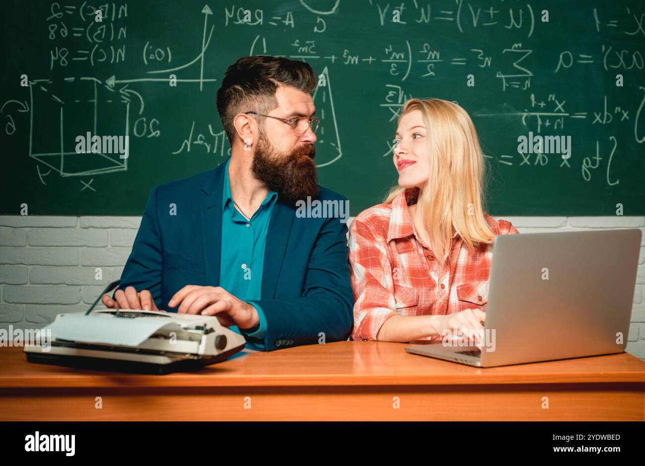 Teacher and student - good learning. Concentrated students following ...