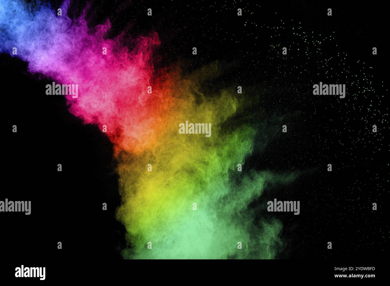 Abstract color powder explosion on black background.Freeze motion of ...