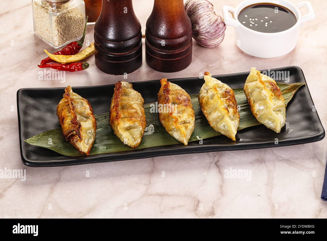 Fried Japanese stuffed dumplings - Gyoza with meat Stock Photo - Alamy