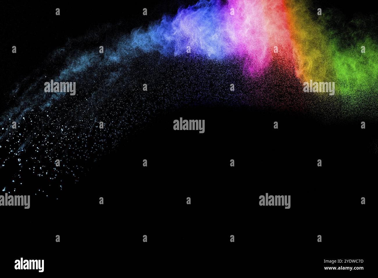 Abstract color powder explosion on black background.Freeze motion of ...