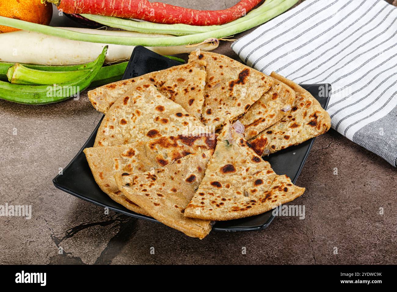 Indian vegetarian Aloo Paratha - bread with potato Stock Photo - Alamy