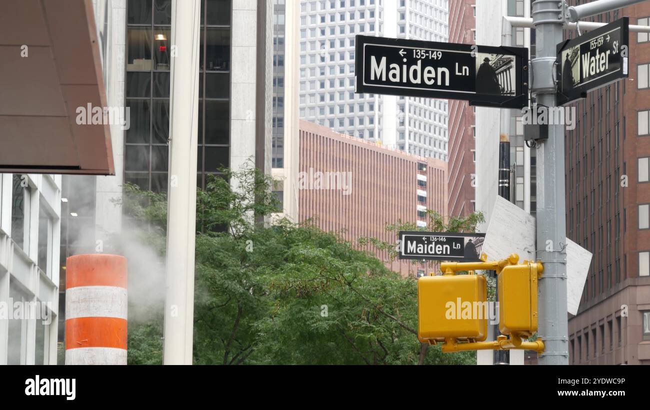 Steam vapor vented on New York City Water street, orange vapour tube ...