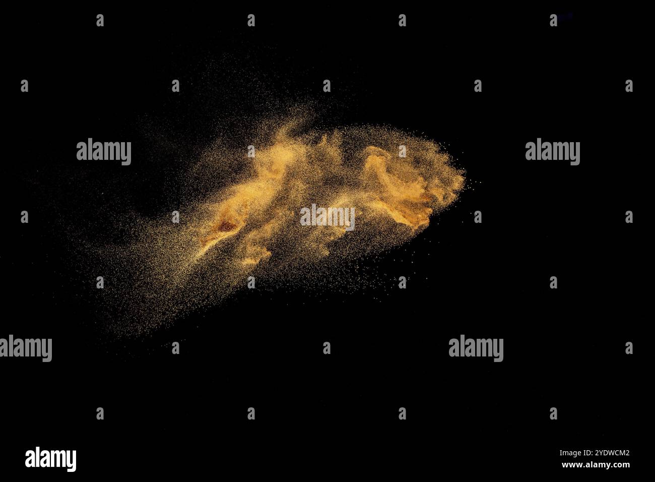 Dry river sand explosion.Brown color sand splash against black ...
