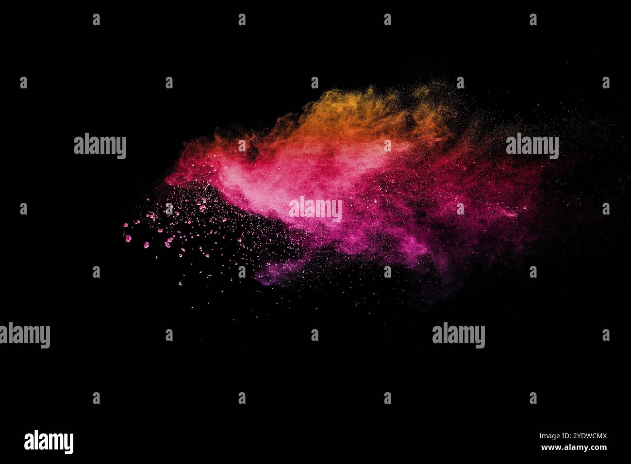 Red yellow powder explosion cloud on black background. Freeze motion of ...
