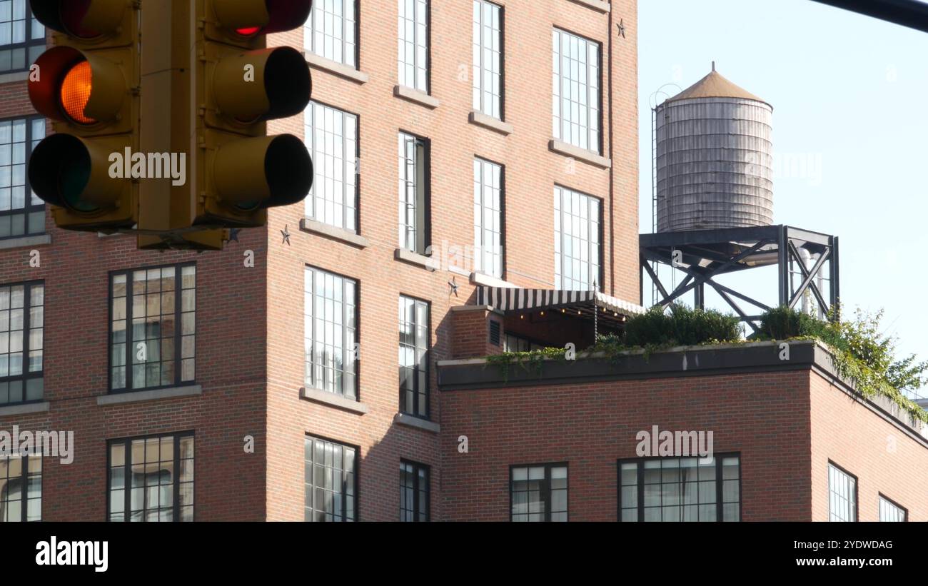 New York City street crossroad, yellow traffic light, transport road ...