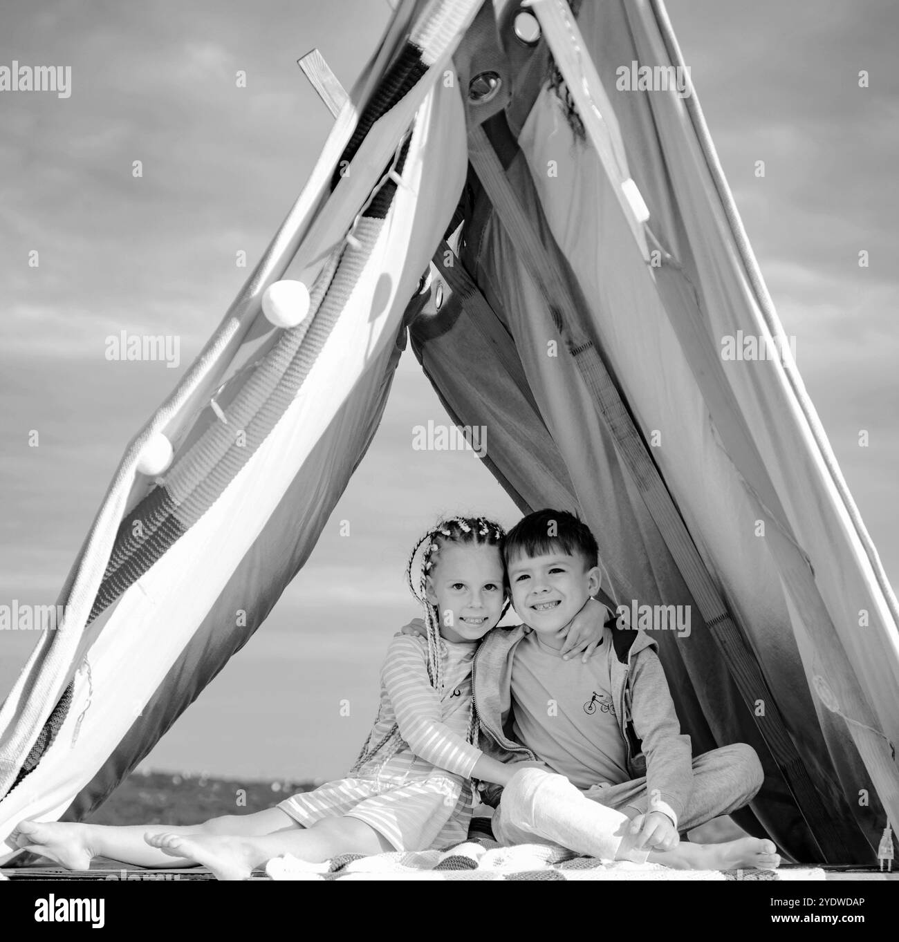Kids in homemade tent. Best friends spend time together. Laughing ...