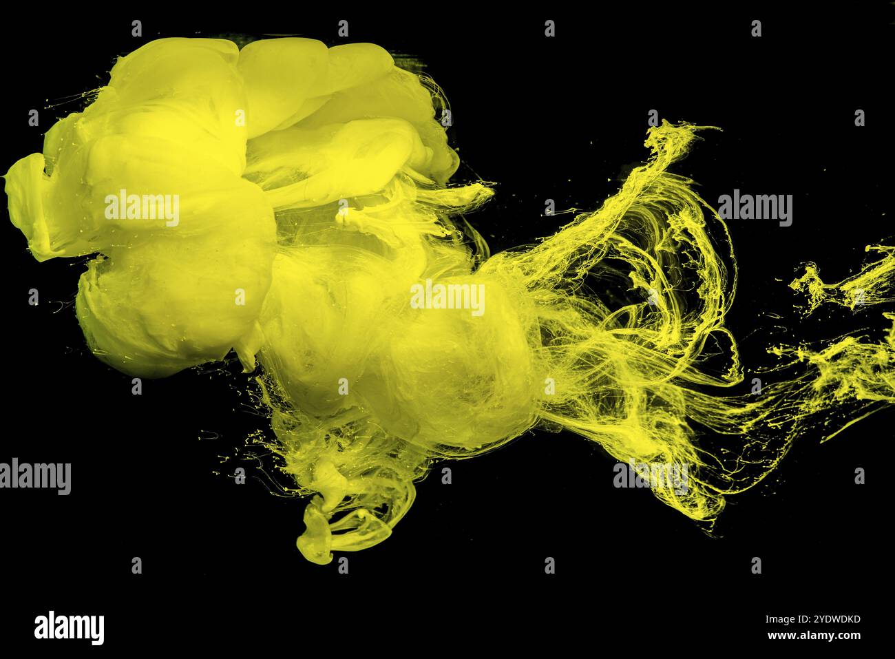 Yellow ink drop swirling on background. Cloud of acrylic ink.Color ...