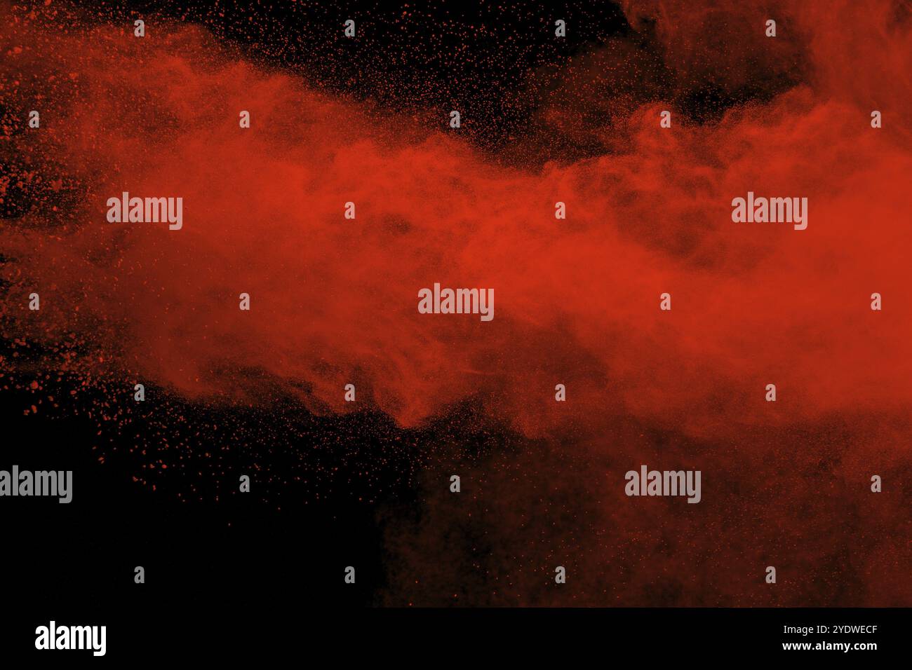 Red color powder explosion on black background.Freeze motion of red ...