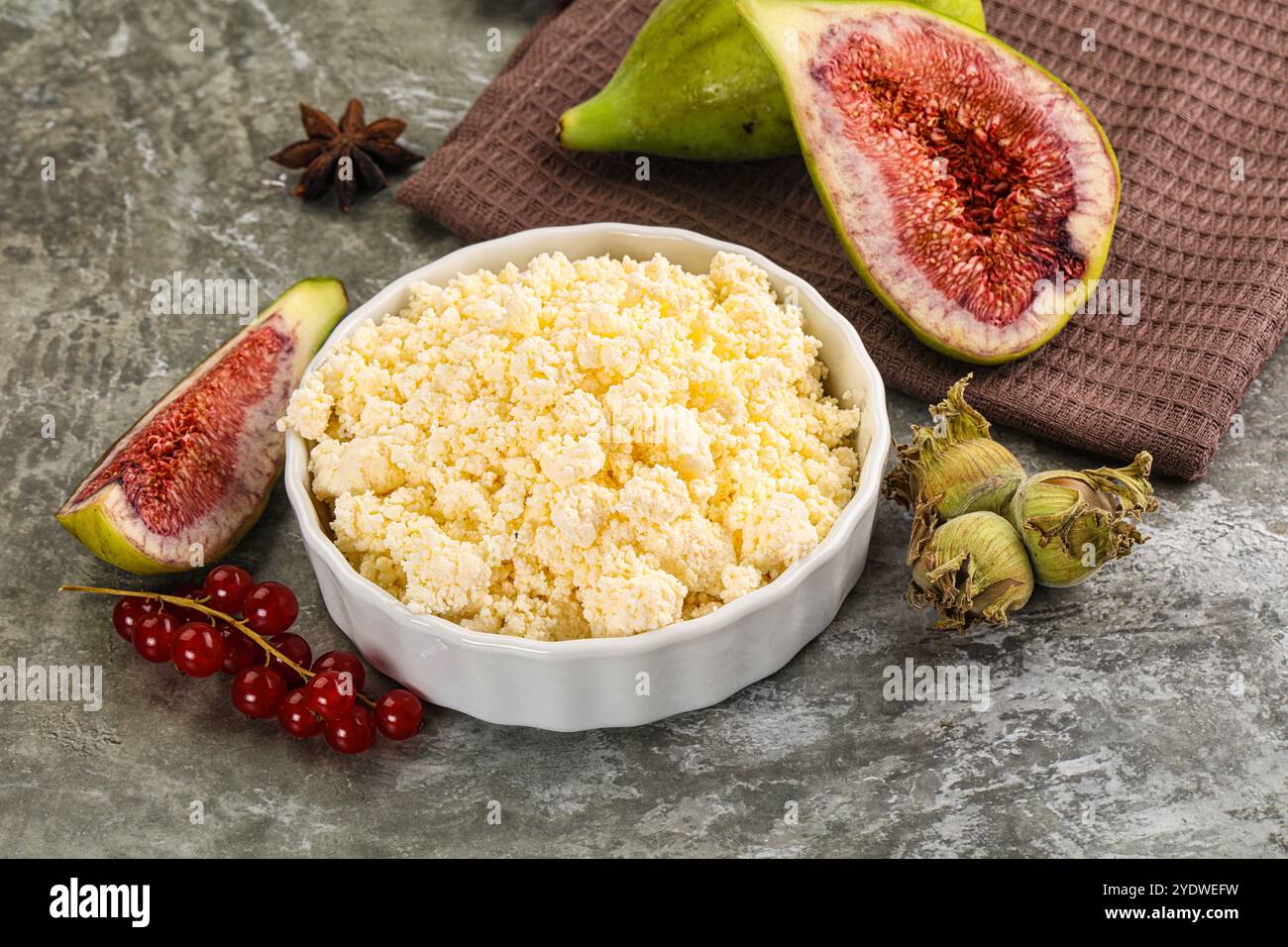 Delicous sheep cottage cheese curd served fig Stock Photo - Alamy