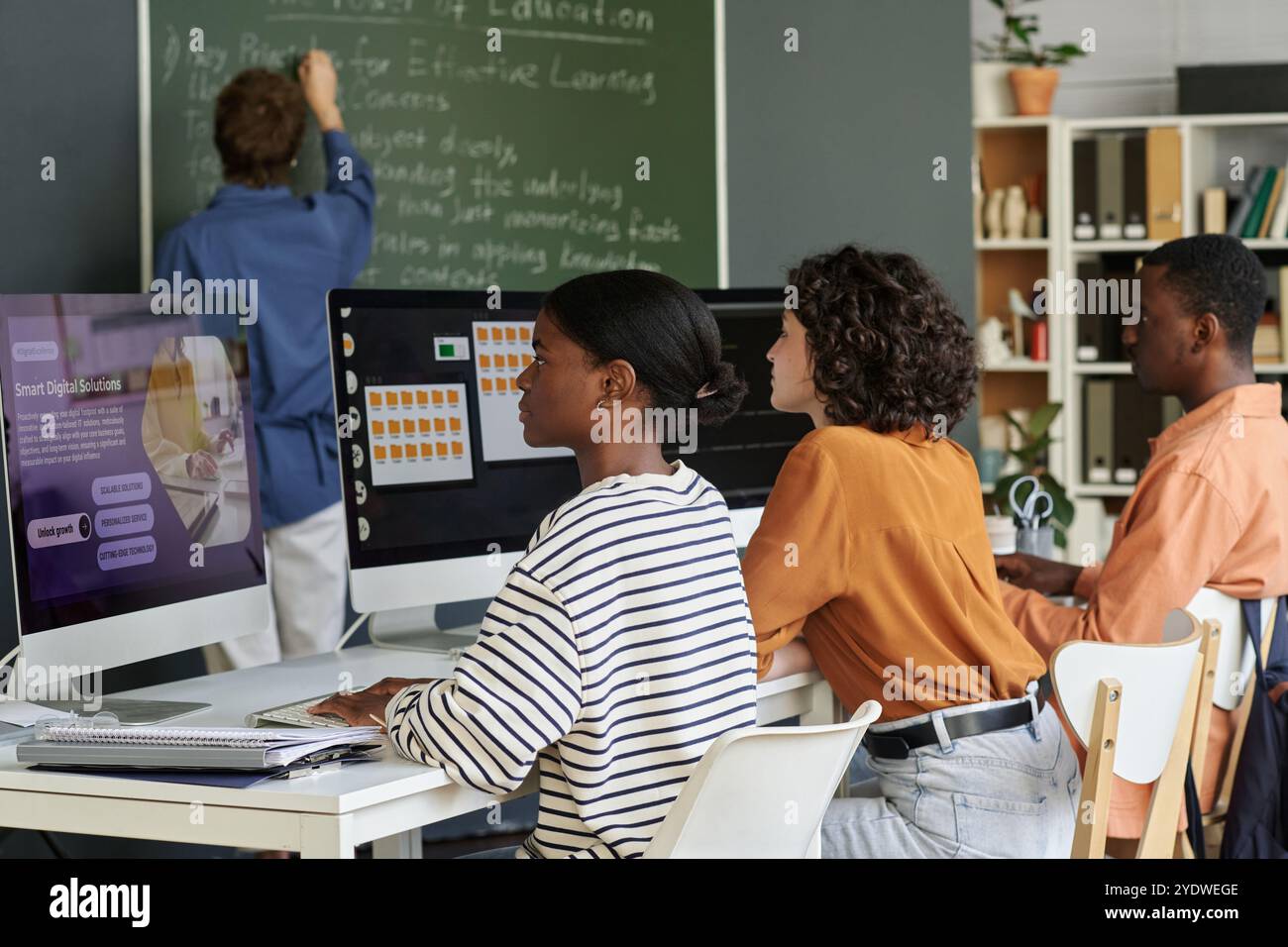 Students Engaging in Academic Computing Activities Stock Photo - Alamy