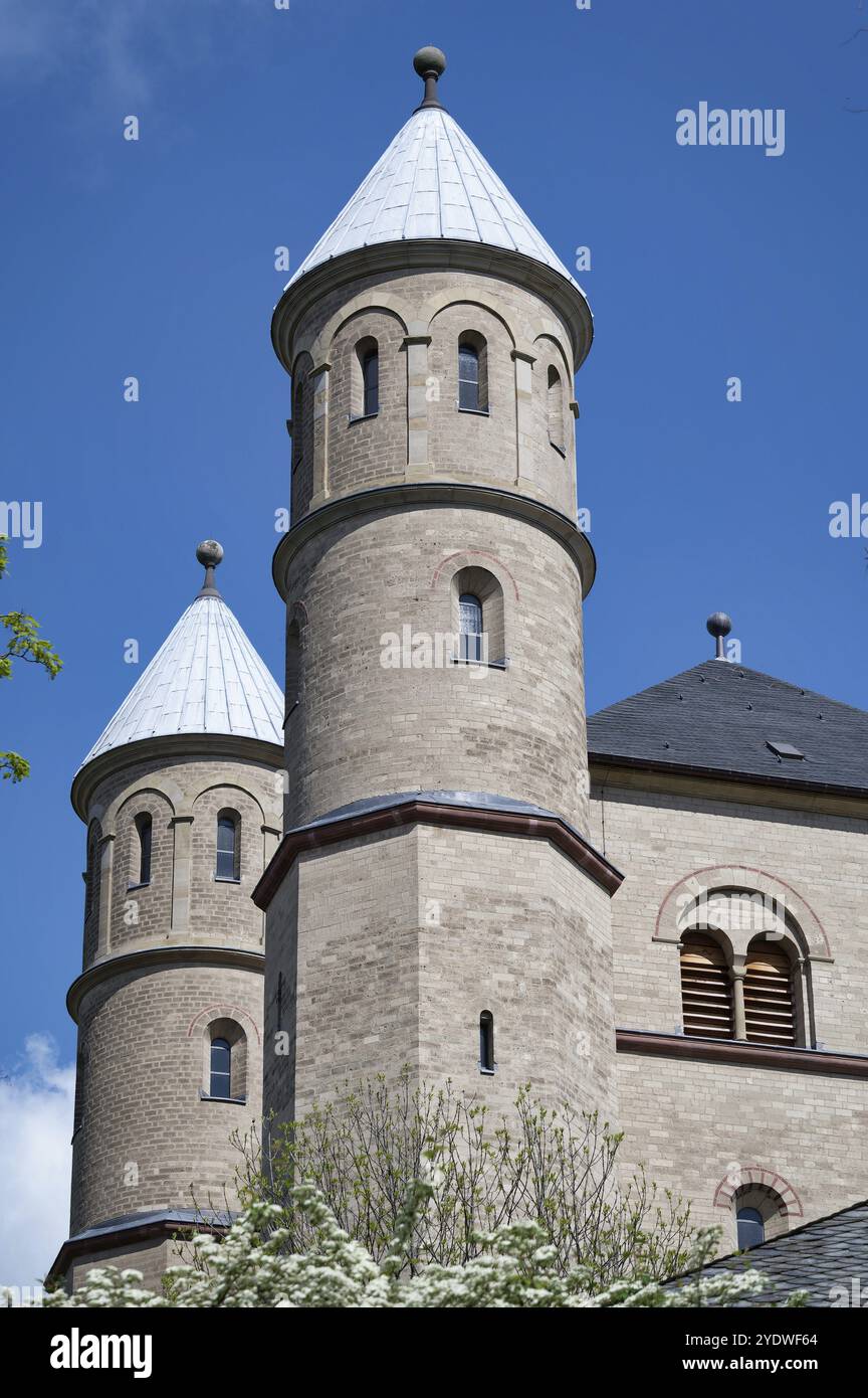 The twin towers of the early Romanesque church of St Pantaleon, one of ...