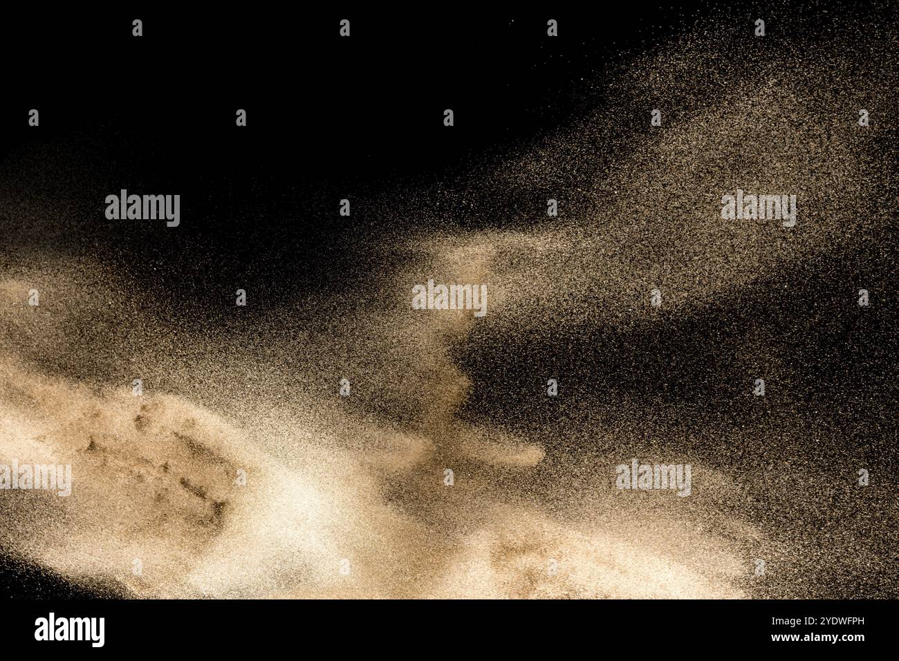 Dry river sand explosion. Golden colored sand splash against dark ...