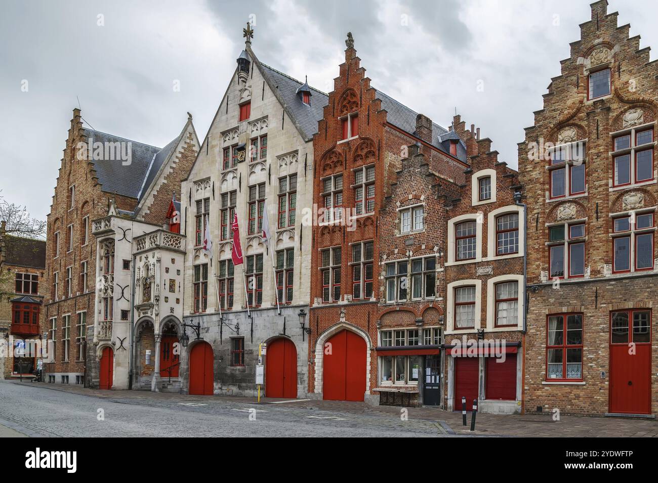 Street with historic houses in Bruges city center, Belgium, Europe ...
