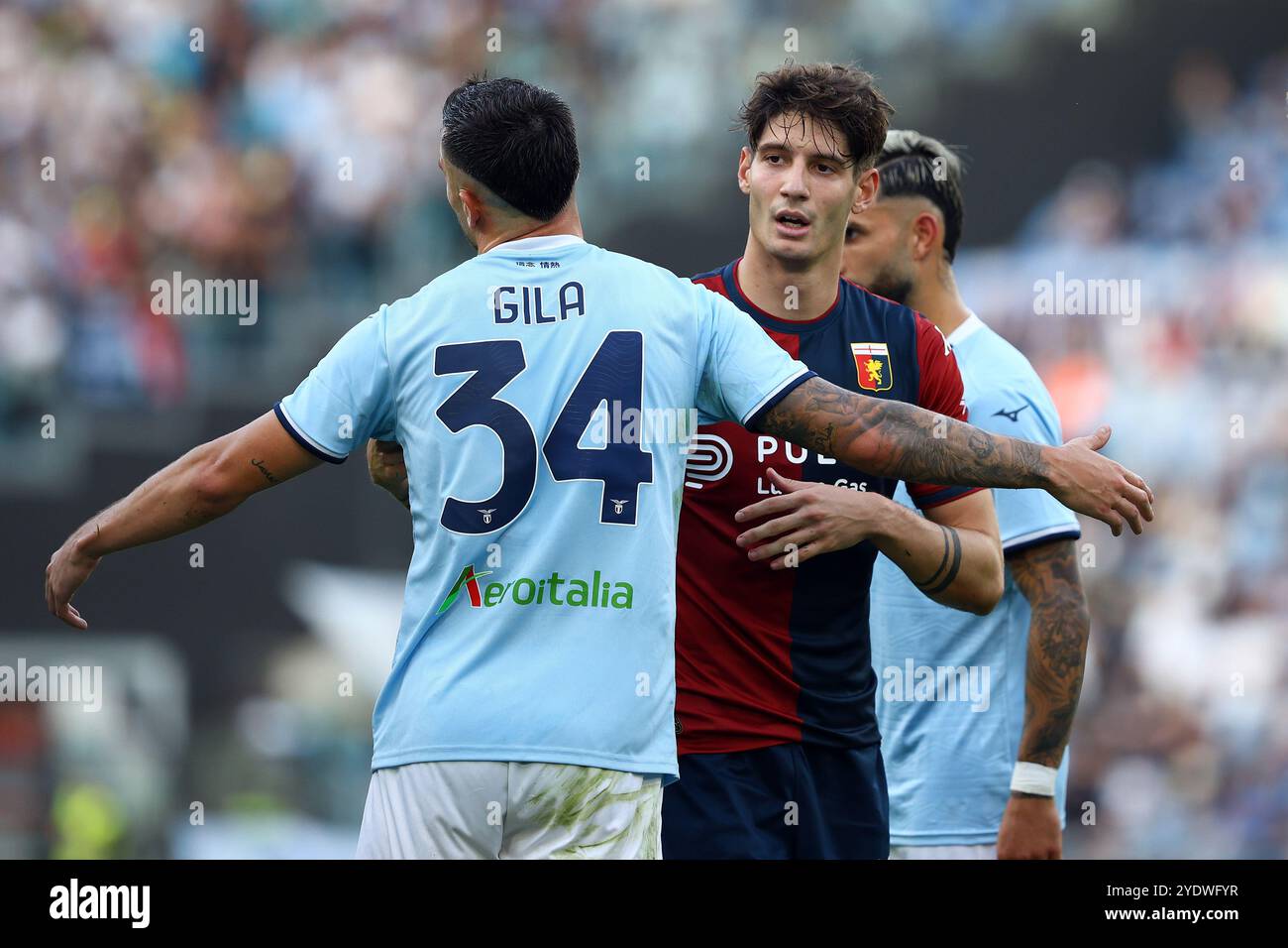 Rome, Italy. 27th Oct, 2024. Mario Gila of Lazio and Alessandro Zanoli of Genoa during the ...