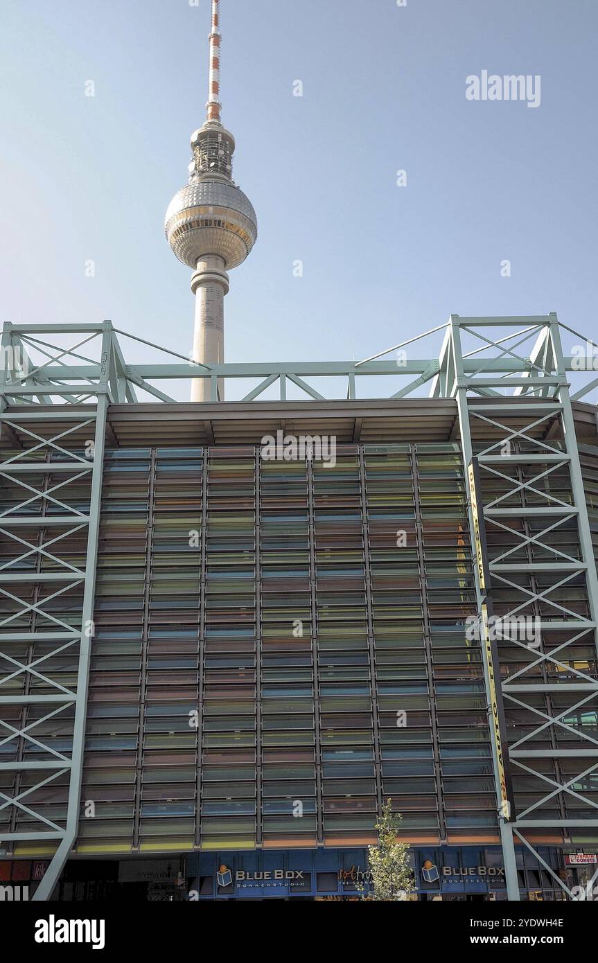 Modern architecture with television tower in the background and glass ...