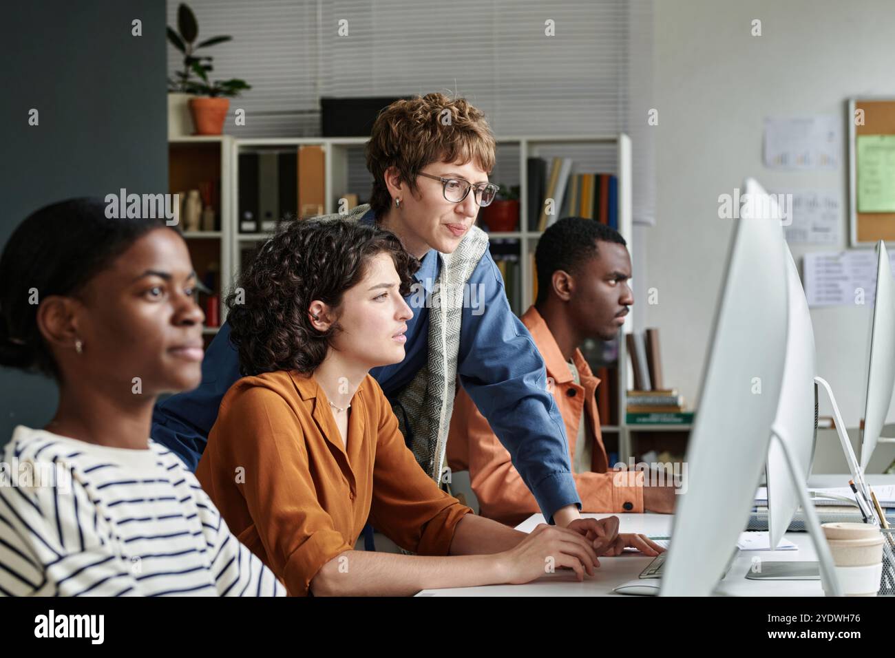 Team male female professionals collaborating hi-res stock photography ...